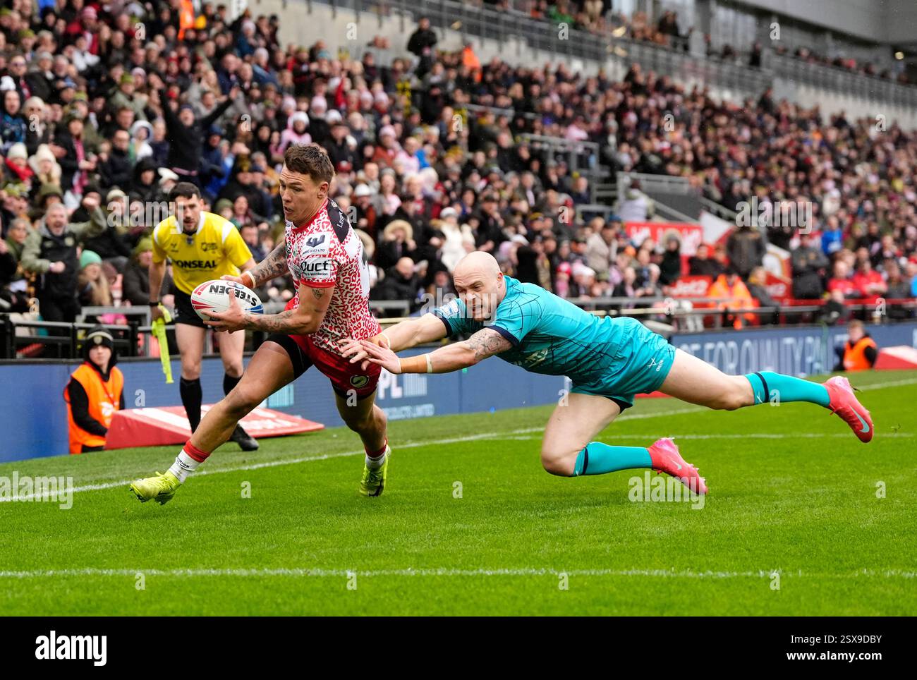 Leigh Leopards' Keanan Brand scores their side's first try of the game ...