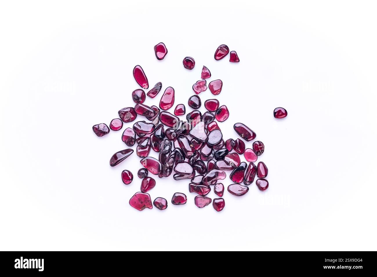 gravel chips Polished red wine garnet stacks top view isolated on white ...