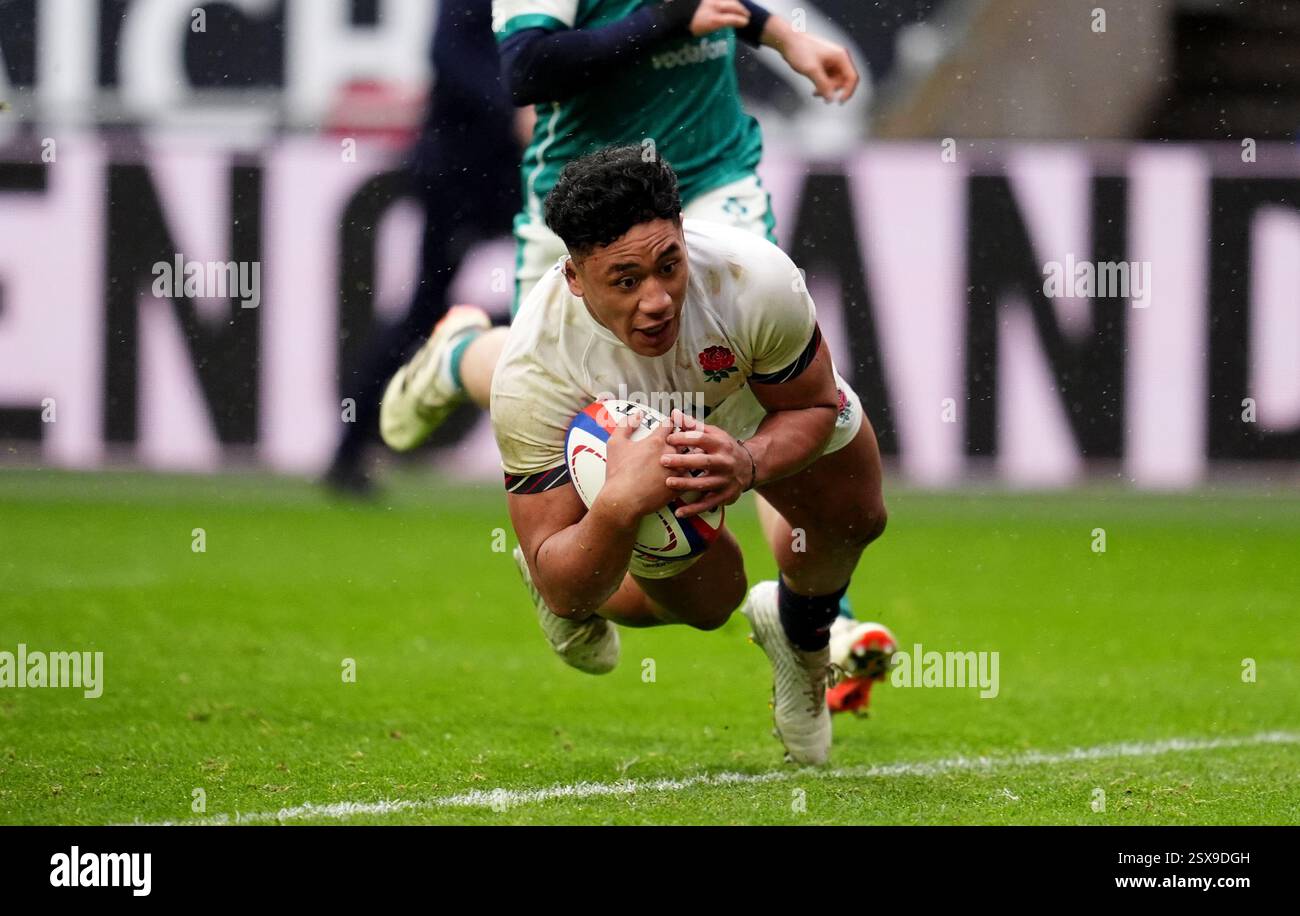 England's Greg Fisilau scores a try during the international friendly ...