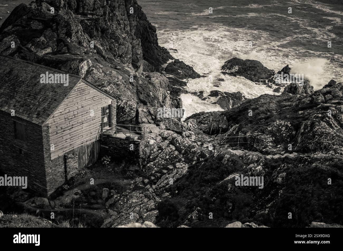 The Net Loft a grade 2 listed building, Peak Rock, Polperro, with waves ...