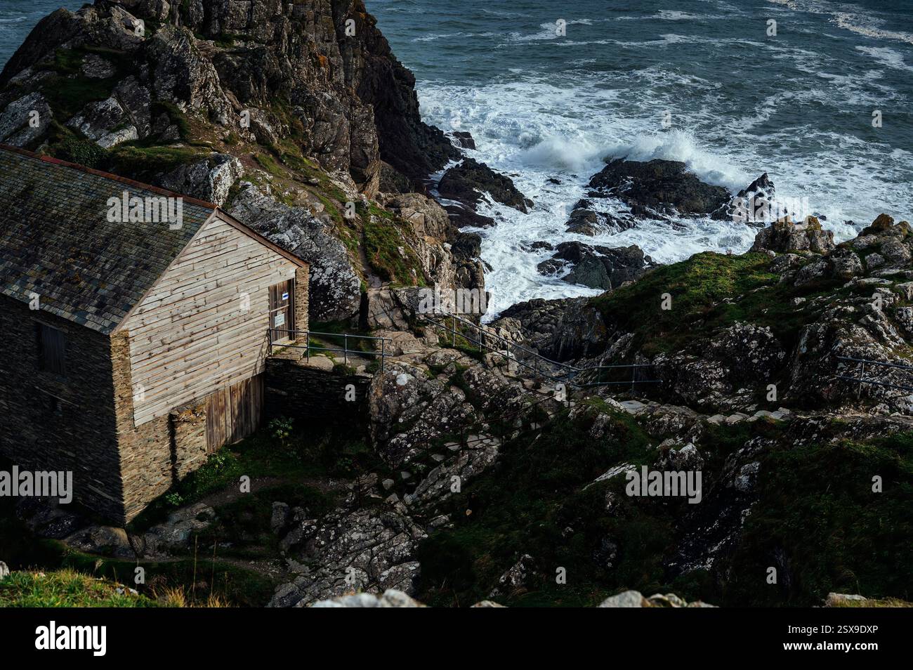 The Net Loft a grade 2 listed building, Peak Rock, Polperro, with waves ...
