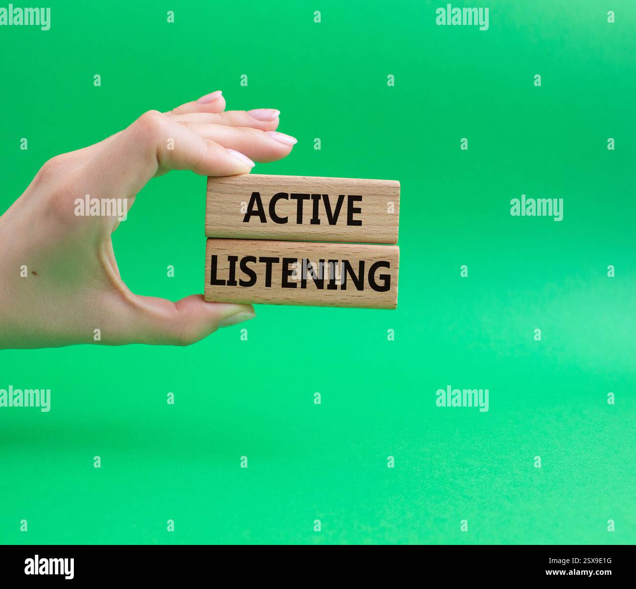 Active listening symbol. Wooden blocks with words Active listening ...