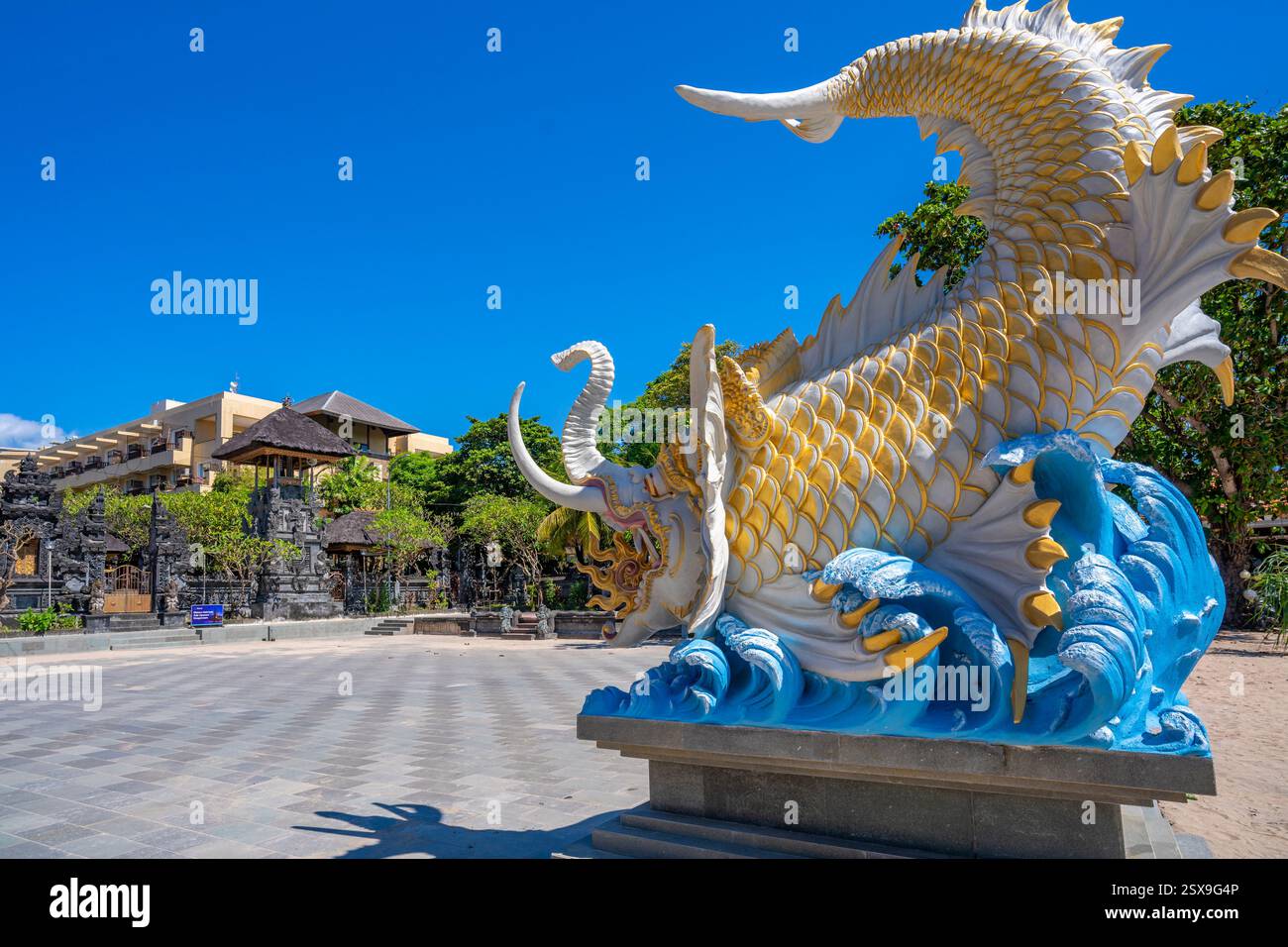 View of sculpture and Hindu Temple near Shelter Kebencanaan on Kuta ...