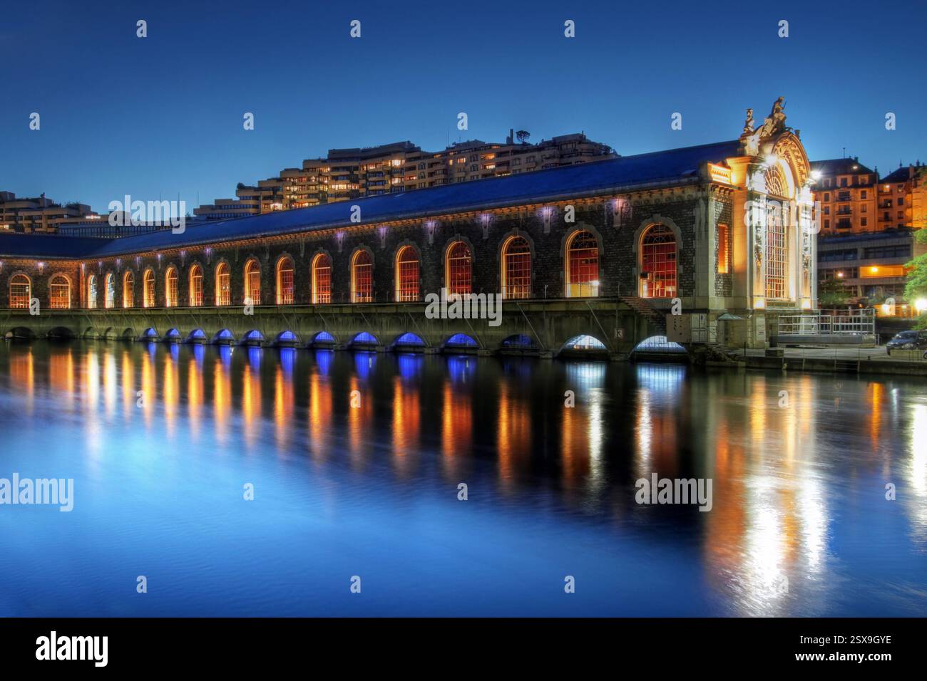 This building anchored in the Rhone as it flows out of Lake Geneva is a ...