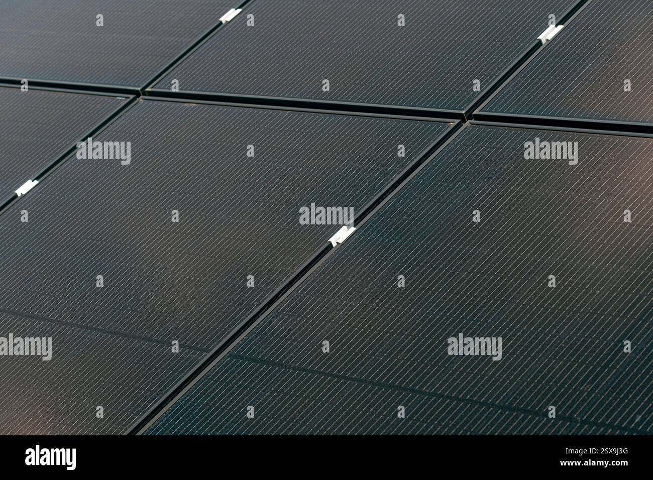 Closeup of solar panel cells surface. Solar energy is renewable and ...