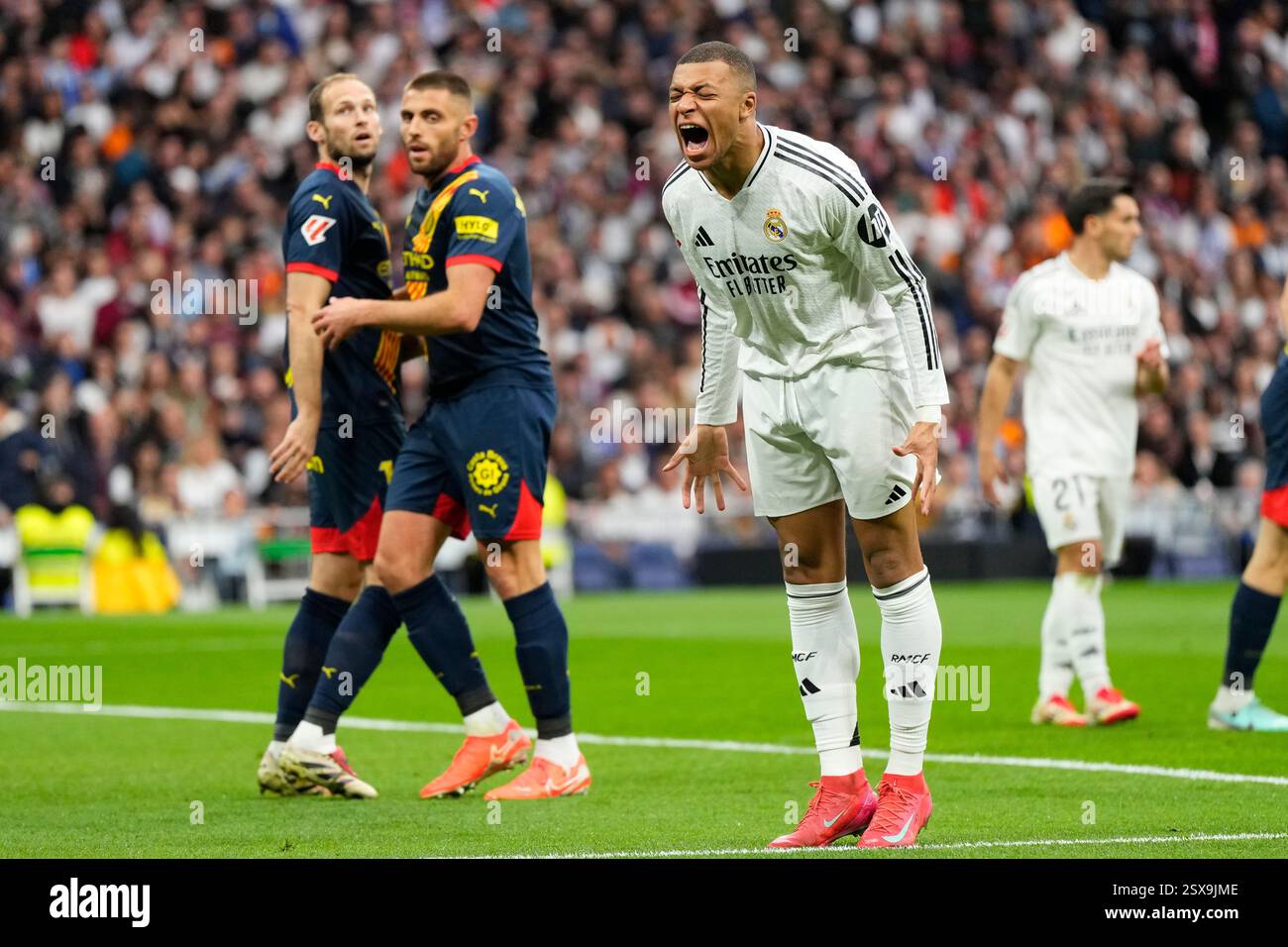 Real Madrid's Kylian Mbappe reacts after missing a chance during the ...