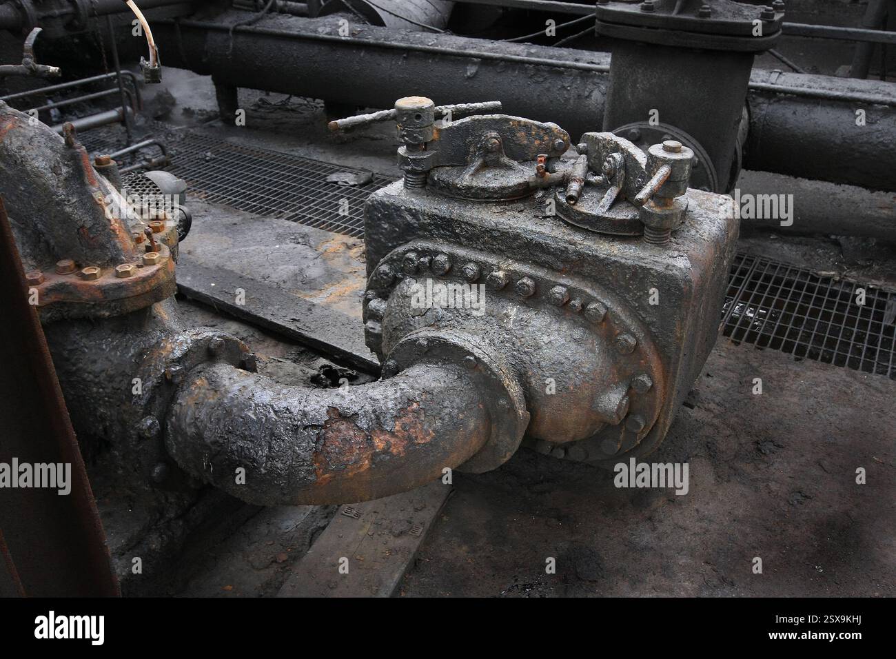 Valves, pipes and pumps on a coke oven by product plant. Chemical works ...