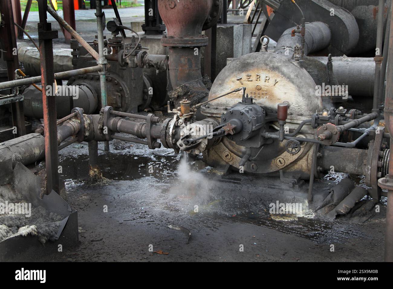 Valves, pipes and pumps on a coke oven by product plant. Chemical works ...