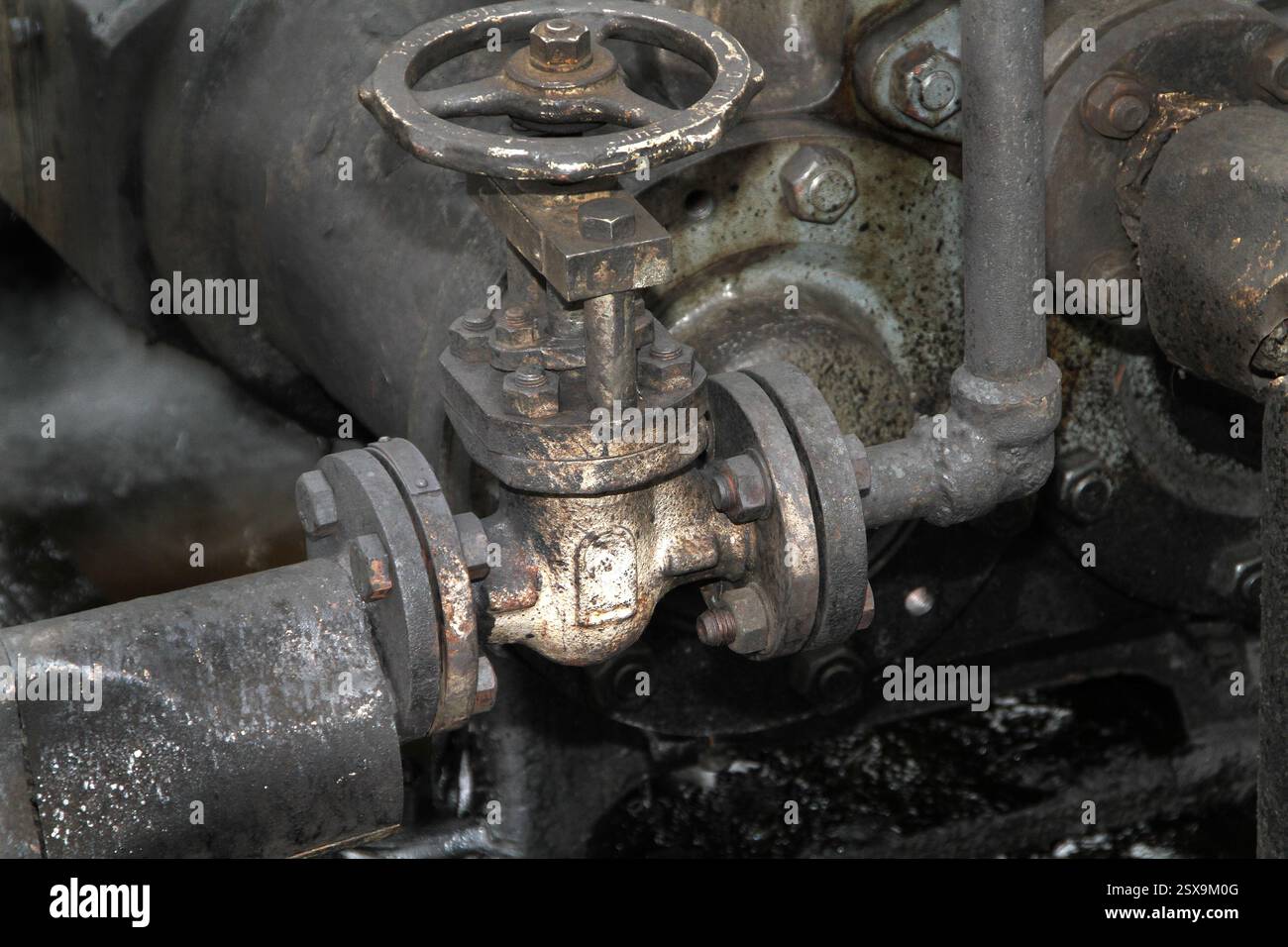 Valves, pipes and pumps on a coke oven by product plant. Chemical works ...