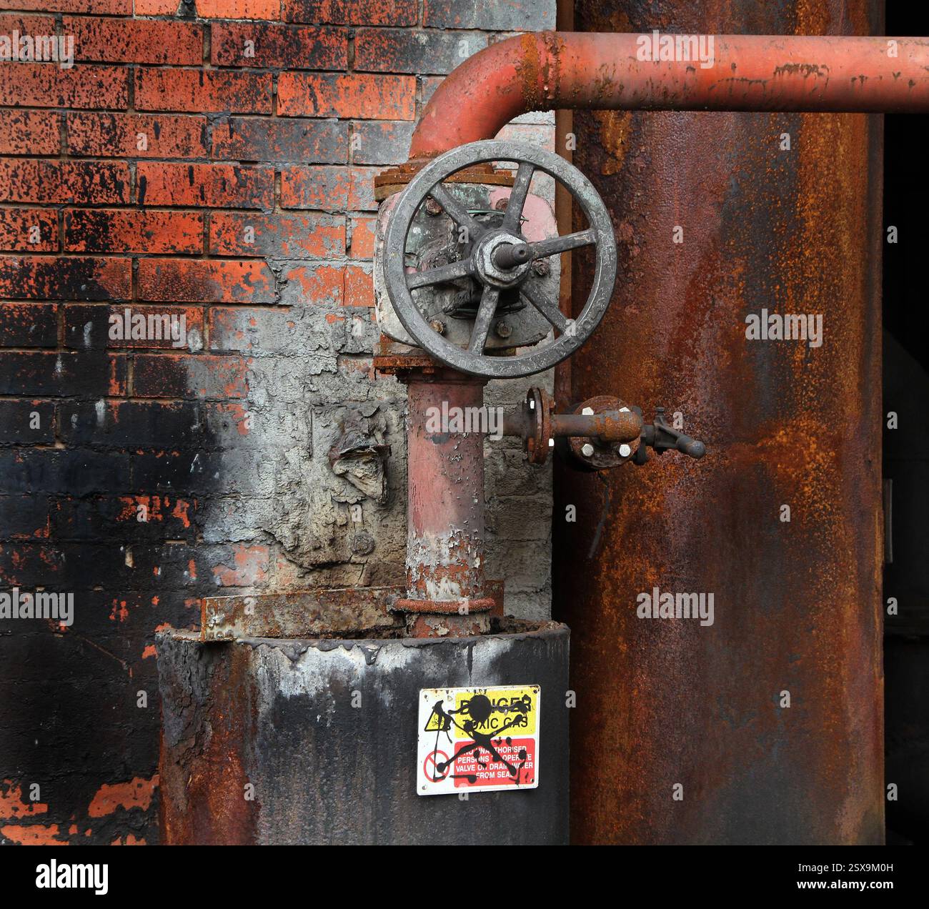 Valves, pipes and pumps on a coke oven by product plant. Chemical works ...