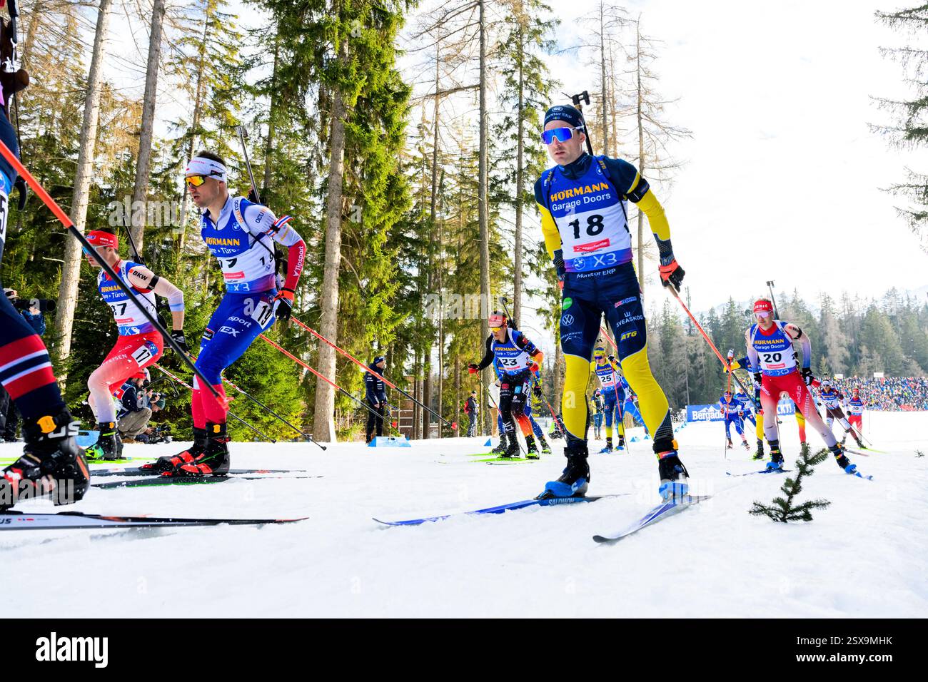250223 Jesper Nelin of Sweden competes in men's 15 km mass start during ...