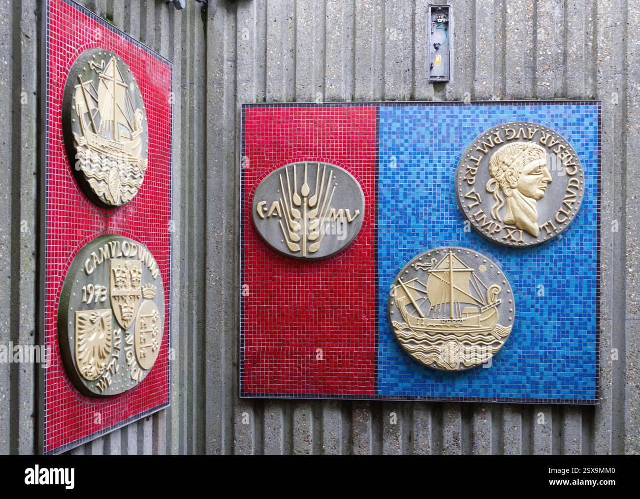 Concrete and mosaic murals of Roman coins made by founding members of ...