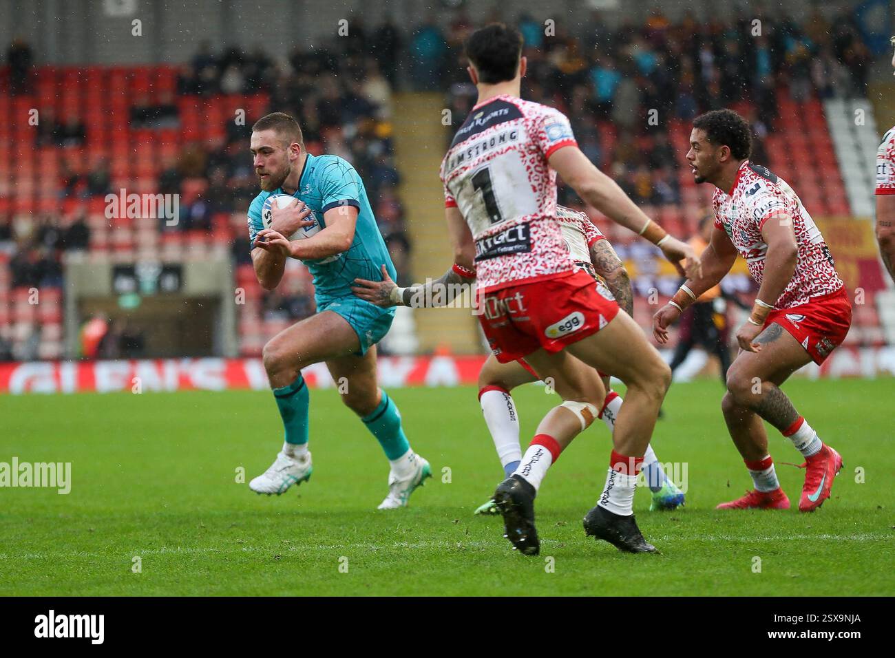 Leigh, UK. 23rd Feb 2025. Sam Hewitt evades the Leigh defence*** during ...