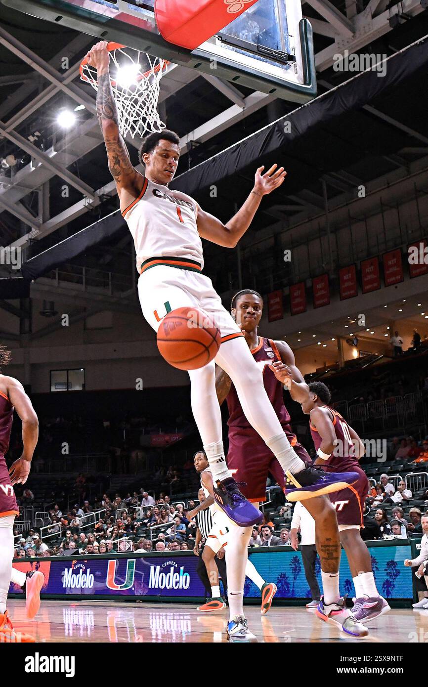 CORAL GABLES, FL - FEBRUARY 22: Miami center Lynn Kidd (1) dunks the ...