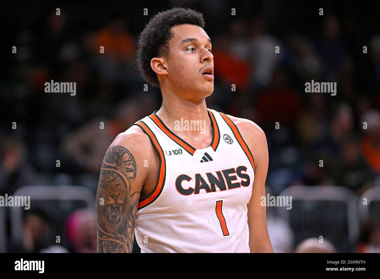 CORAL GABLES, FL - FEBRUARY 22: Miami center Lynn Kidd (1) speaks with ...