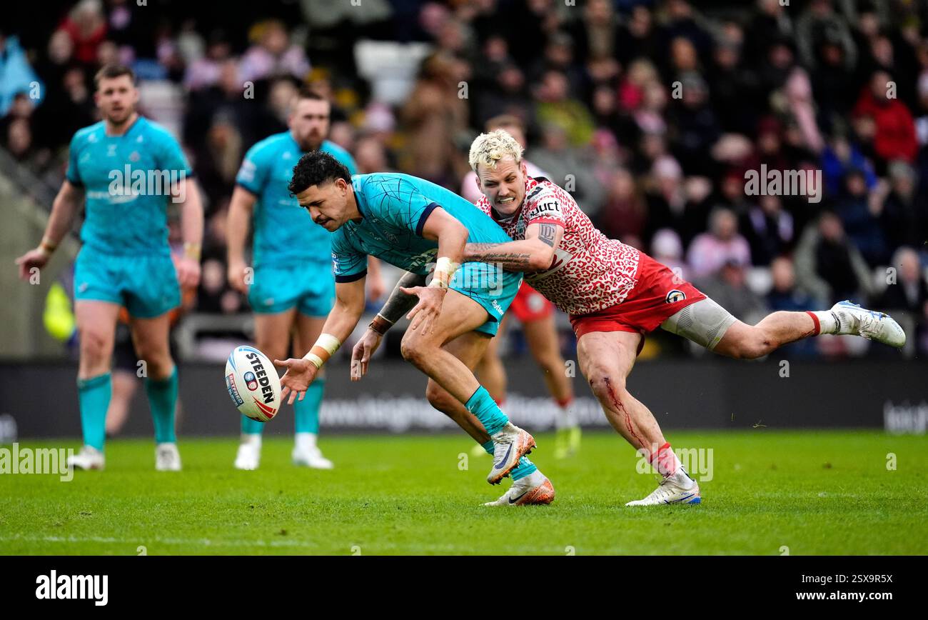 Huddersfield Giants' Jacob Gagai tackled by Leigh Leopards' Ethan O ...