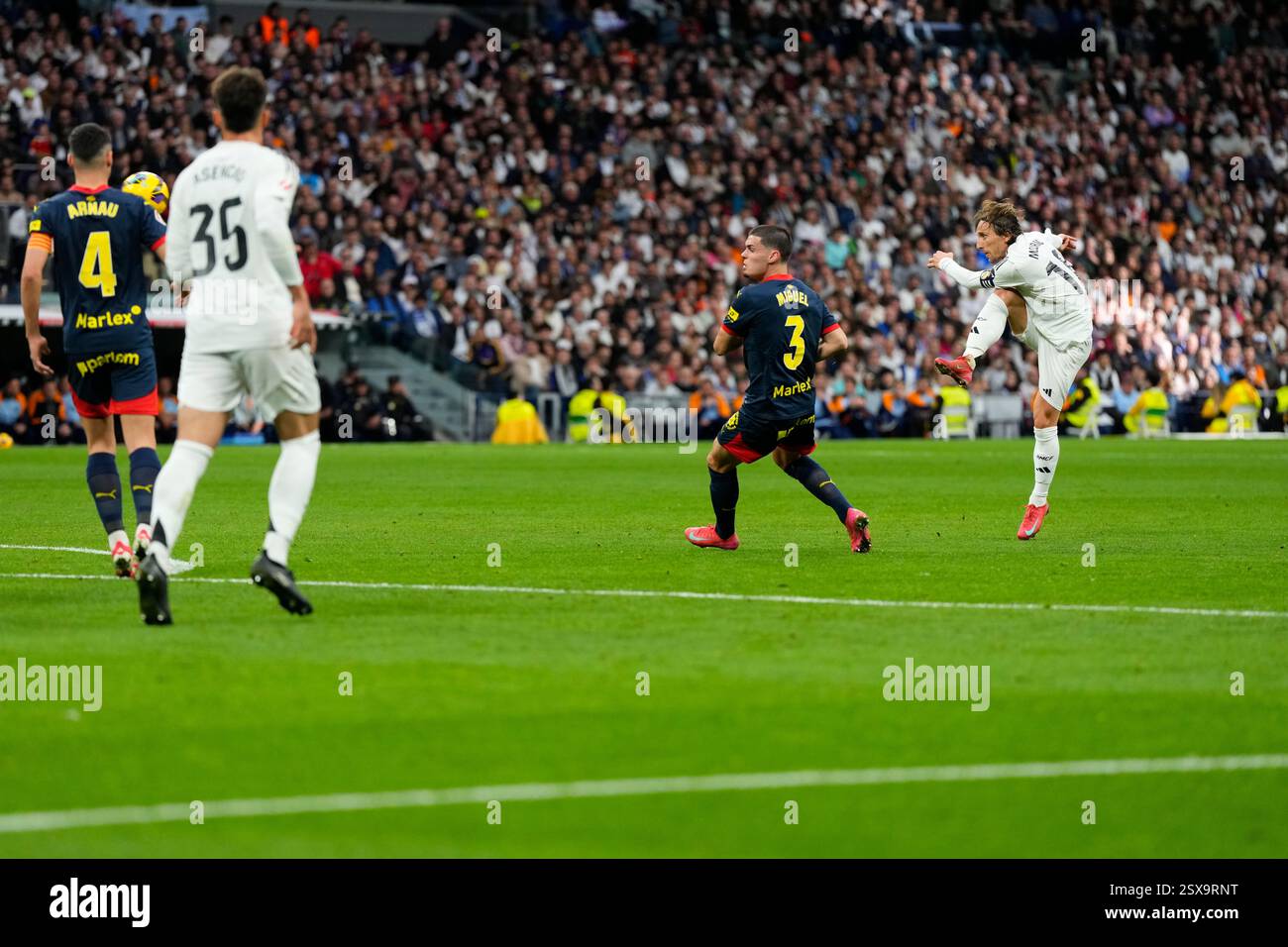 Real Madrid's Luka Modric, right, scores the opening goal during the ...