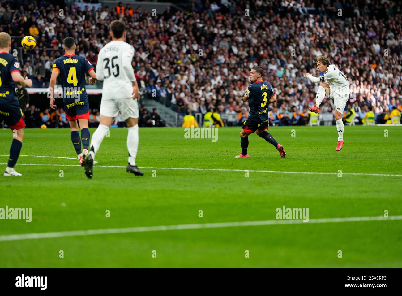 Real Madrid's Luka Modric, right, scores the opening goal during the ...