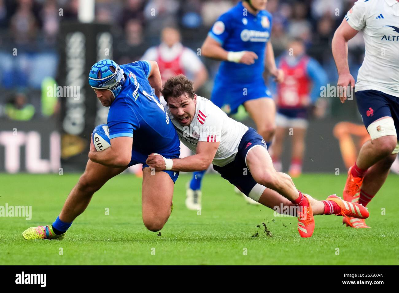 Rome, Italy. 23rd Feb, 2025. Gianmarco Lucchesi of Italy and Antoine Dupont of France during the ...