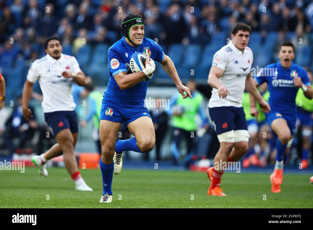 Rome, Italy. 23th Feb, 2025. Juan Ignacio Brex runs in a try during the ...