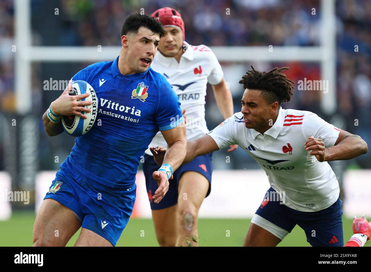 Rome, Italy. 23th Feb, 2025. Tommaso Menoncello of Italy runs in a try ...