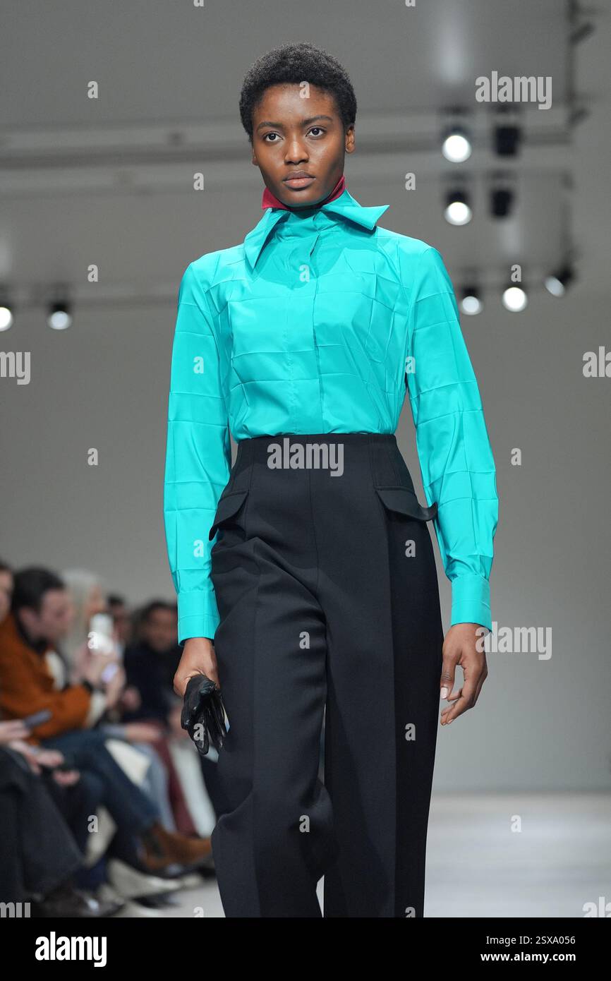 Models on the catwalk during the Emilia Wickstead show at Saatchi Gallery, London, during London ...