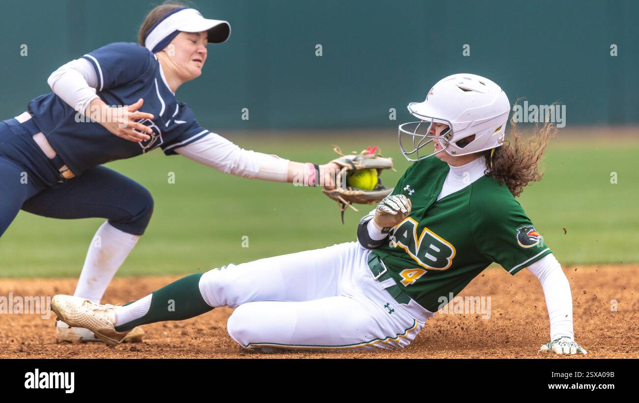 UAB outfielder Bella Wiggins (4) slides in safely at second as Southern ...