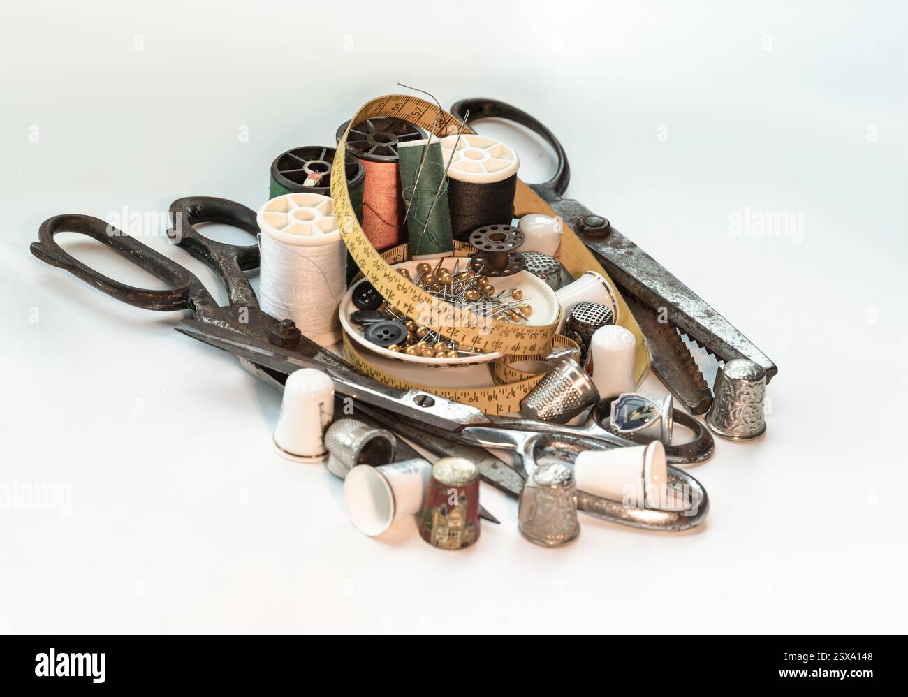 Steel scissors, Thimbles, Spools of thread of various colour, Sewing ...