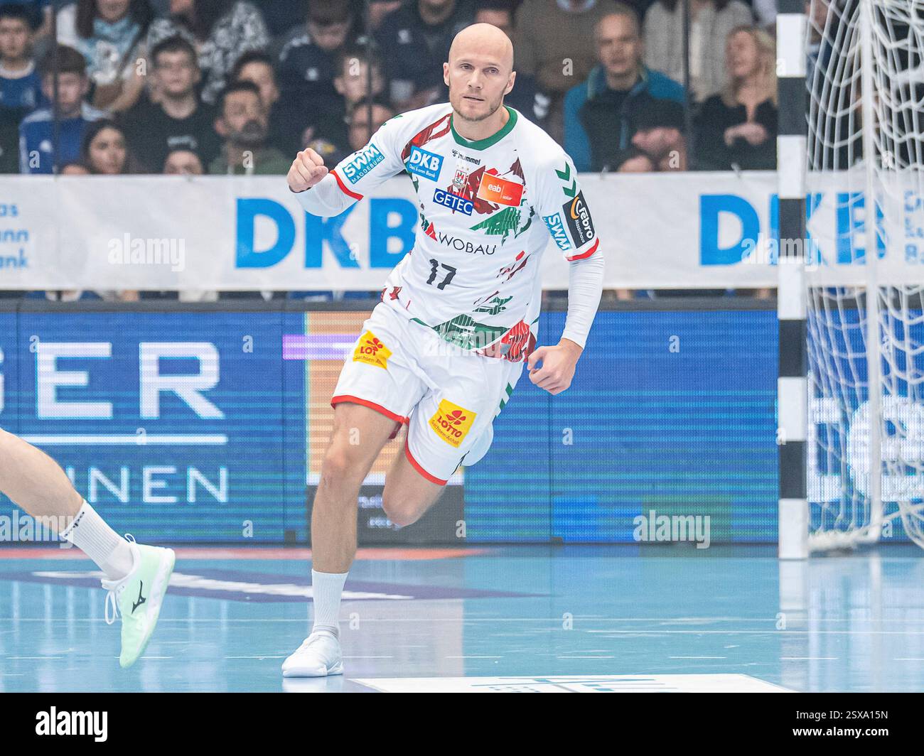 Goeppingen, Deutschland. 23rd Feb, 2025. Tim Hornke (SC Magdeburg, #17 ...