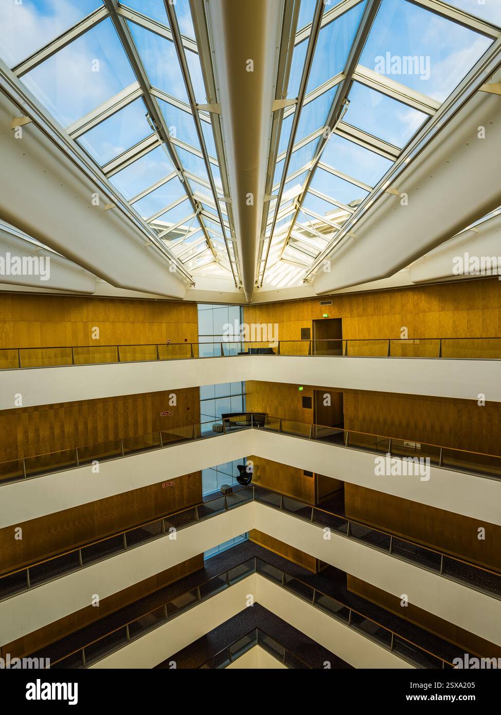 A spacious hotel atrium in Kastrup Denmark showcases modern architecture with multiple levels ...