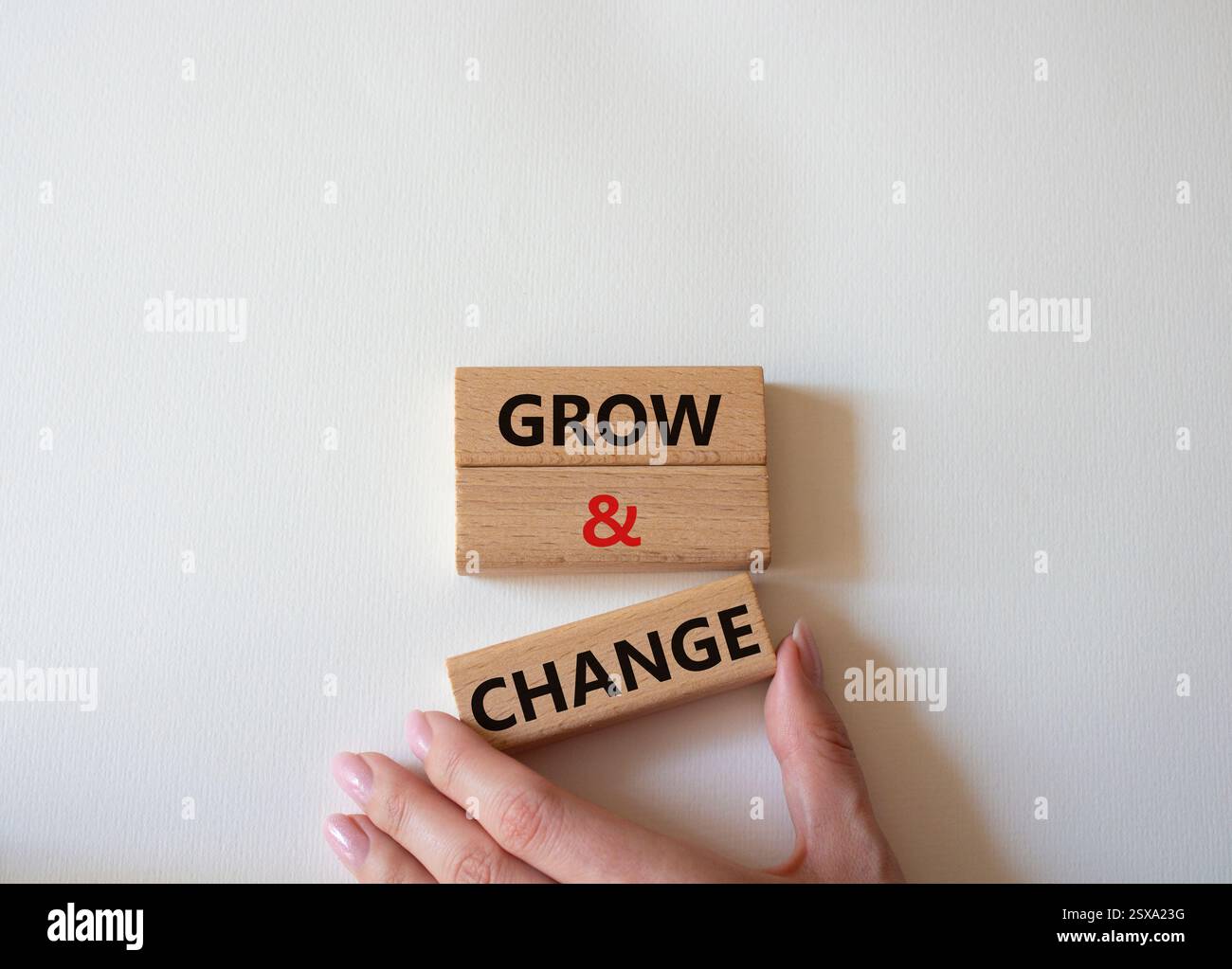 Grow and Change symbol. Concept word Grow and Change on wooden blocks ...