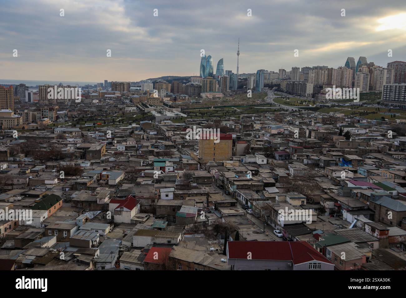 General view of Soviet buildind and modern building in center of Baku ...