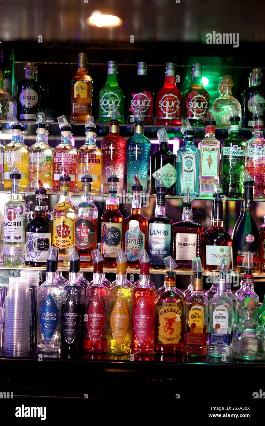 General views of alcoholic drinks and bottles of spirits behind a bar ...
