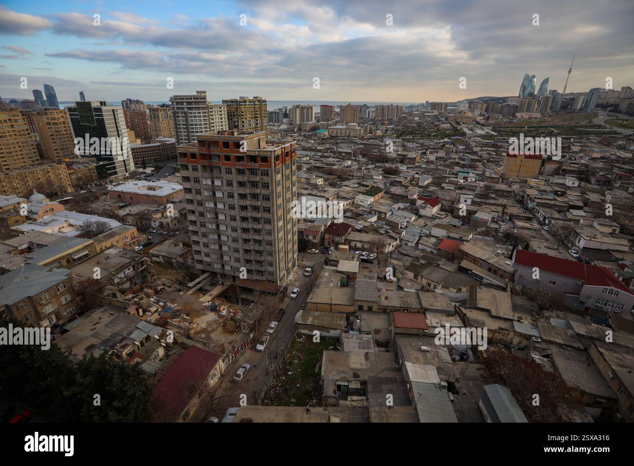 General view of Soviet buildind and modern building in center of Baku ...