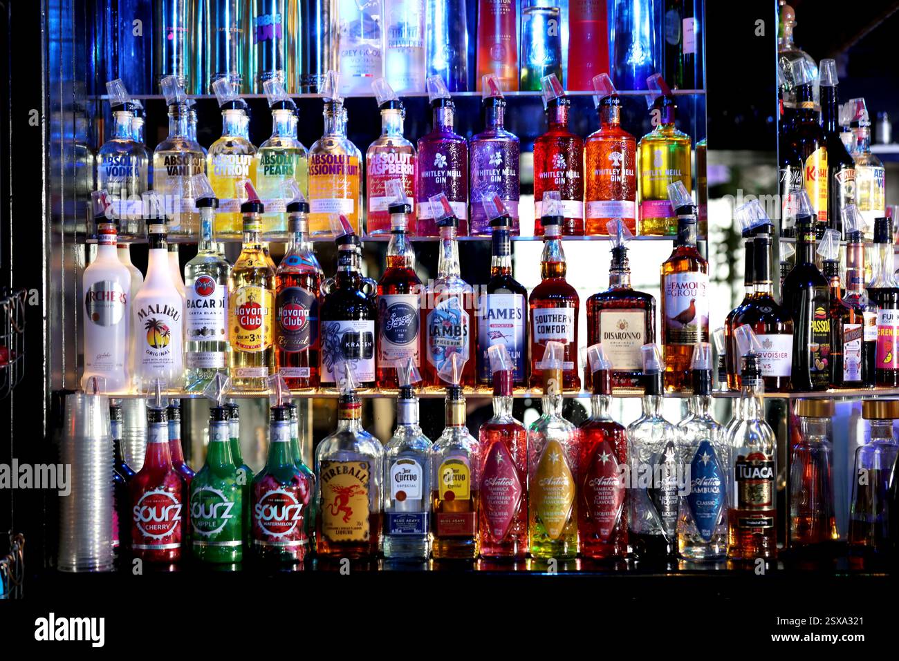 General views of alcoholic drinks and bottles of spirits behind a bar ...