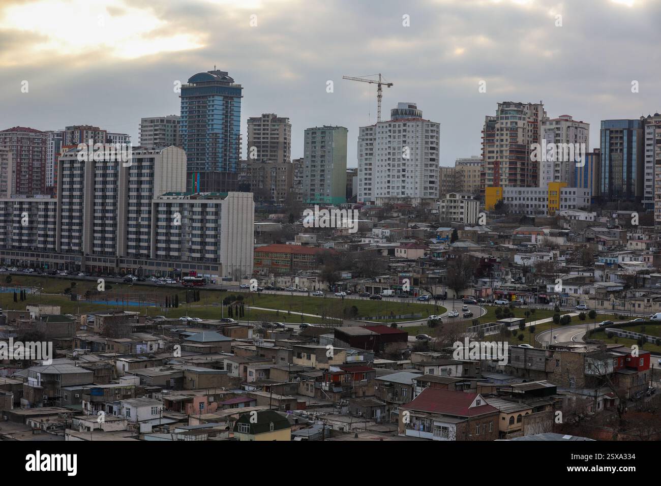 General view of Soviet buildind and modern building in center of Baku ...