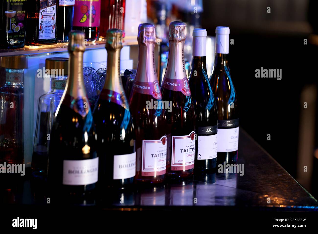 General views of alcoholic drinks and bottles of spirits behind a bar ...