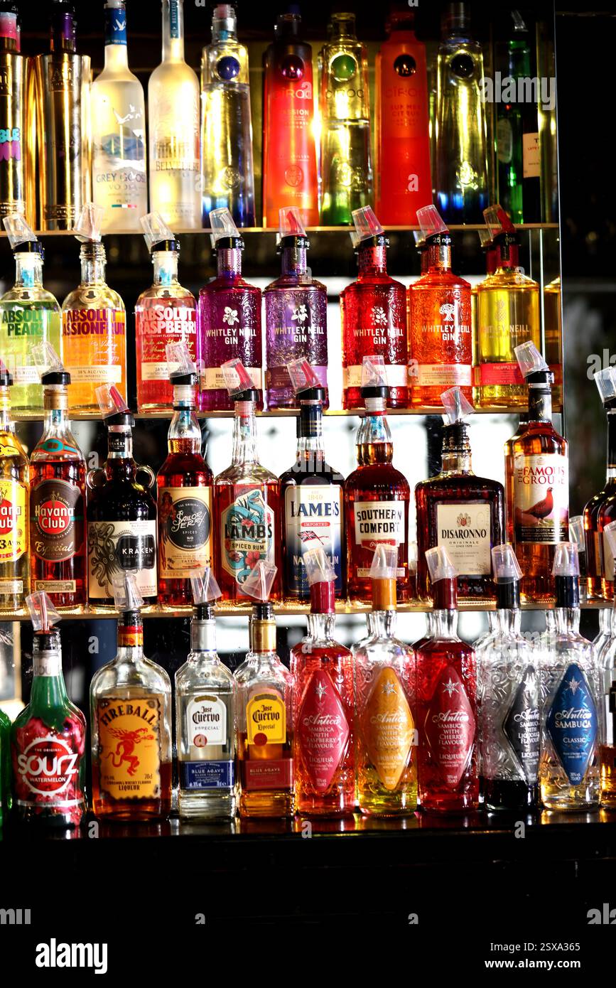 General views of alcoholic drinks and bottles of spirits behind a bar ...