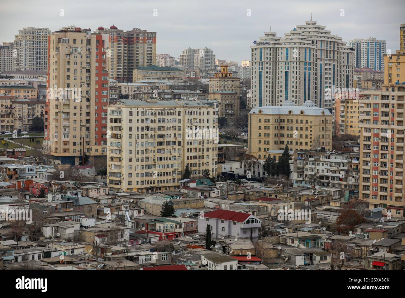 General view of Soviet buildind and modernt building in center of Baku ...