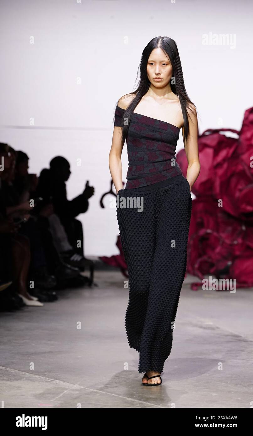 Models on the catwalk during the Chet Lo show at Newgen, central London ...