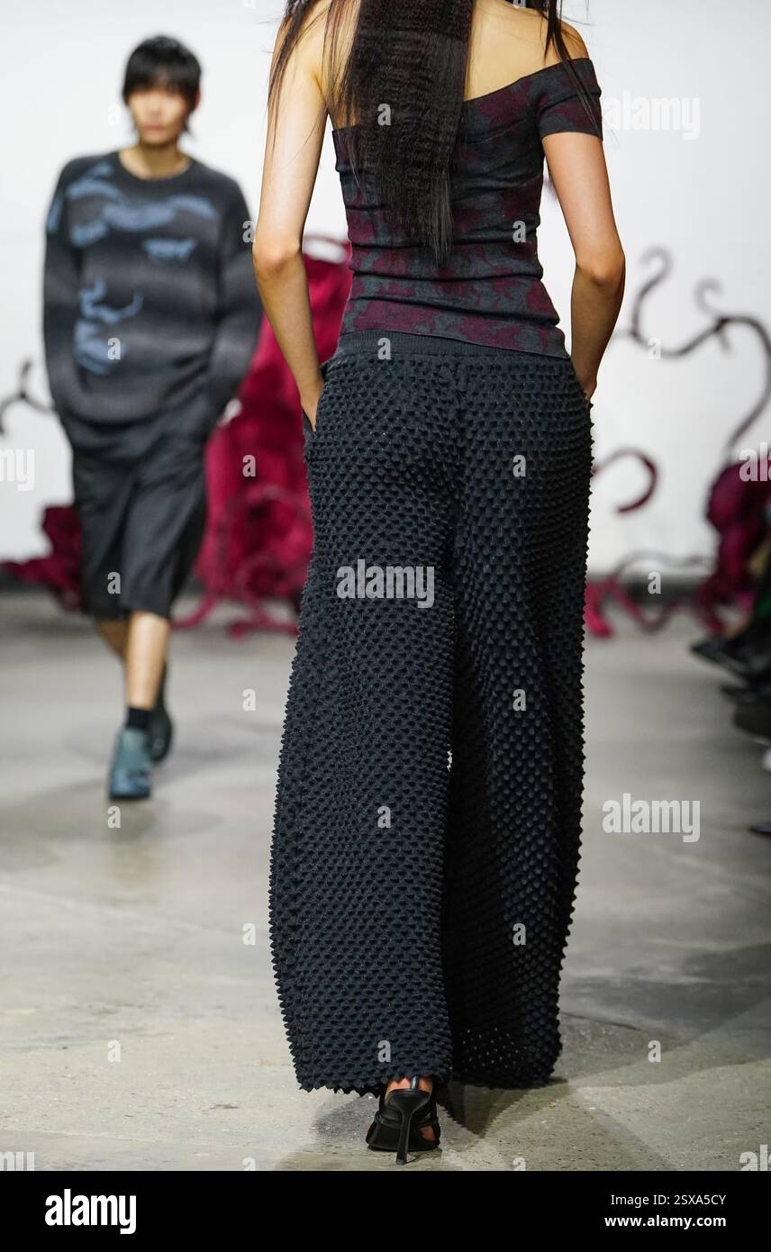 Models on the catwalk during the Chet Lo show at Newgen, central London ...