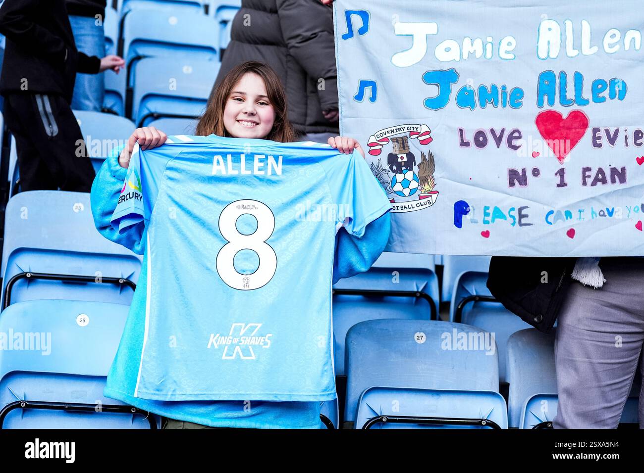 COVENTRY, ENGLAND - FEBRUARY 22: A young Coventry City fan shows the shirt of Jamie Allen of ...
