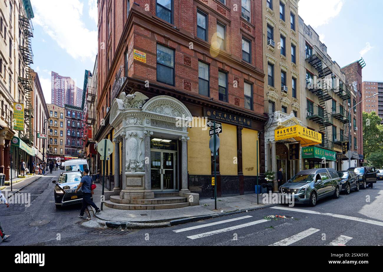 An elaborate cast iron storefront inset with stone and terra cotta at ...