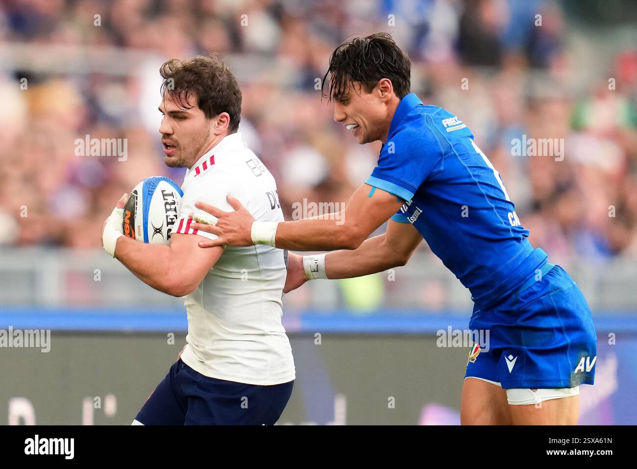 Rome, Italy. 23rd Feb, 2025. Antoine Dupont of France and Ange Capuozzo of Italy during the ...