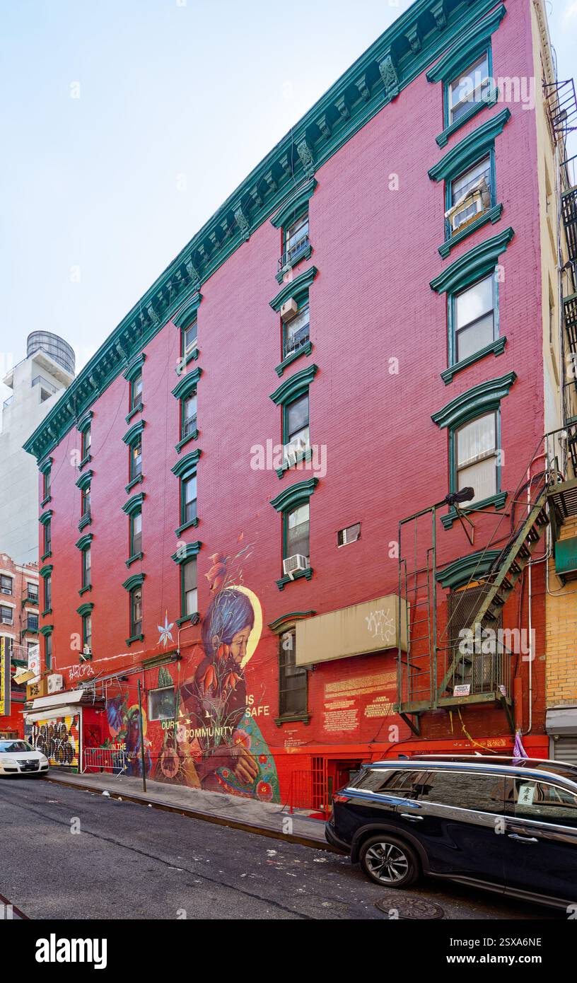 The mural “In The Future Our Asian Community Is Safe” is painted on the ...