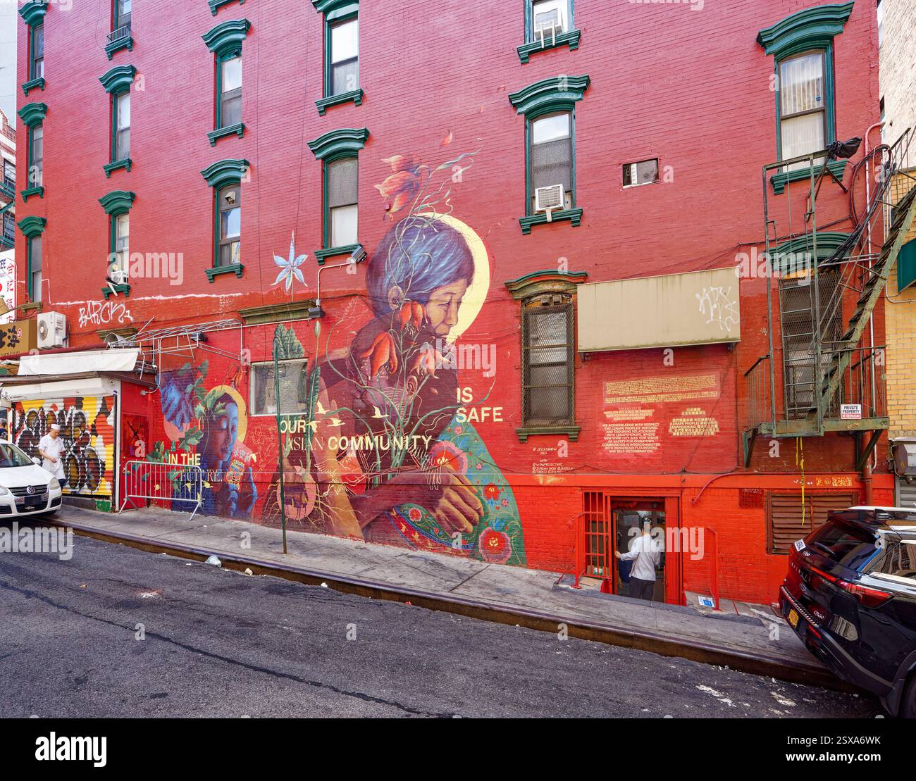 The mural “In The Future Our Asian Community Is Safe” is painted on the ...