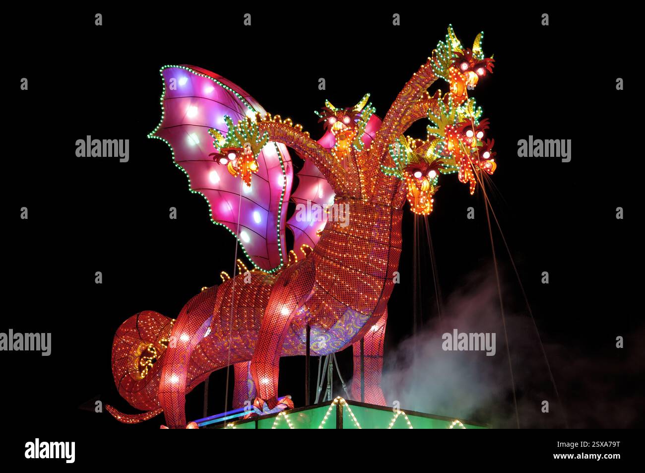 A flexible giant puppet made of bamboo and paper in shape of a dragon ...