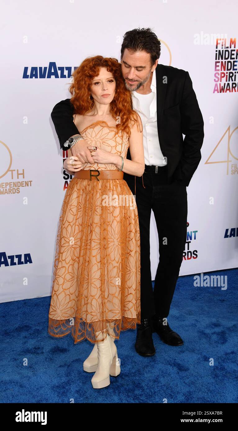 SANTA MONICA, CALIFORNIA - FEBRUARY 22: (L-R) Natasha Lyonne and Bryn Mooser attend the 2025 ...