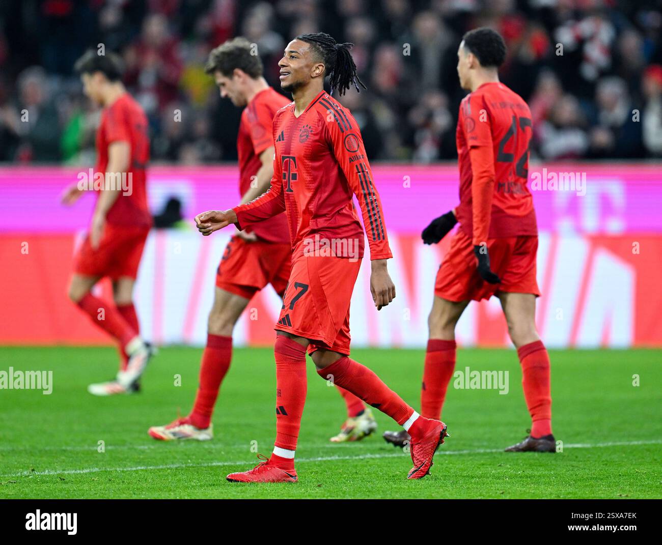 Michael Olise of Munich celebrates scoring during the Bundesliga soccer ...