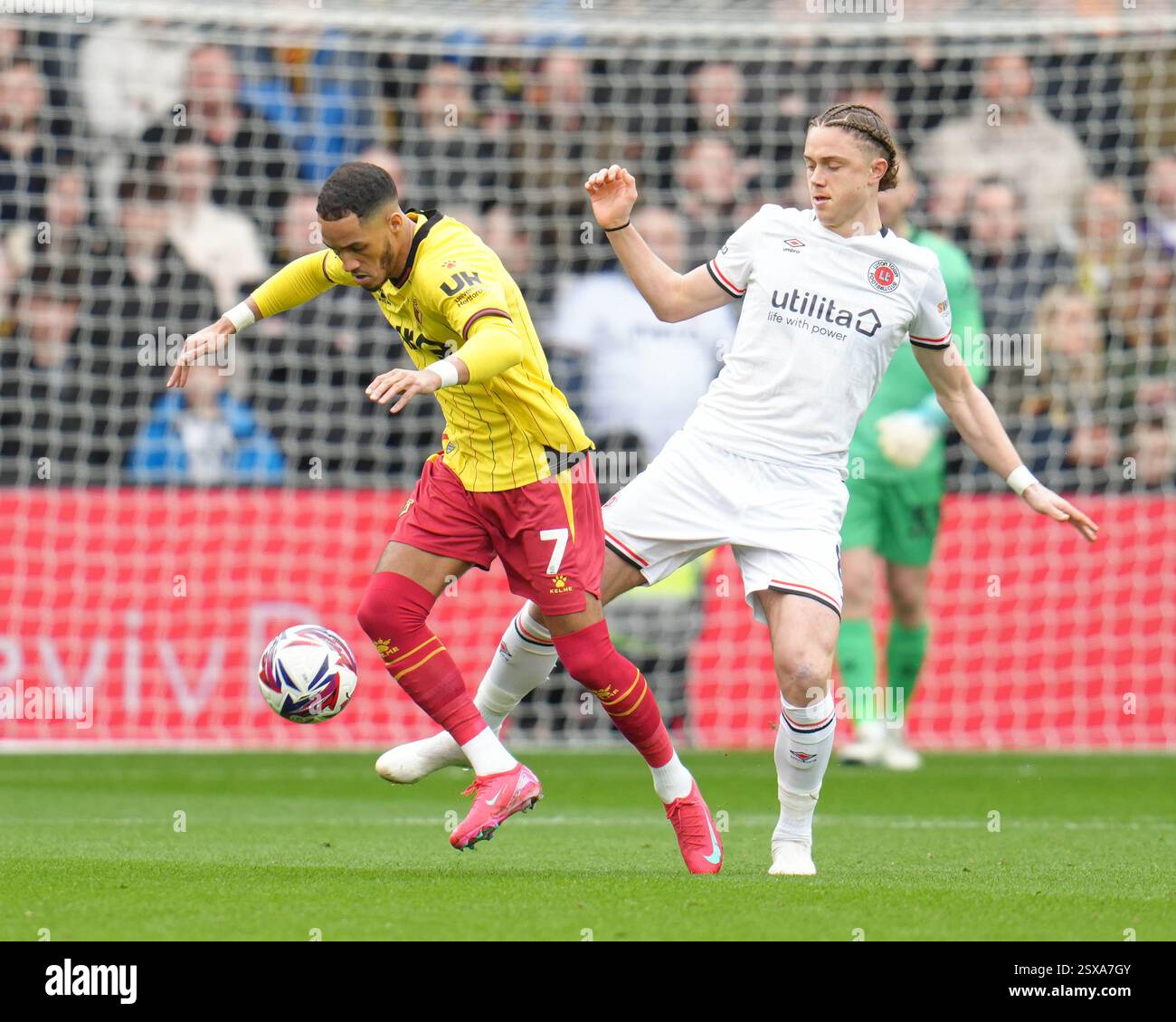 Thelo Aasgaard of Luton Town attempts to challenge Thomas Ince of ...